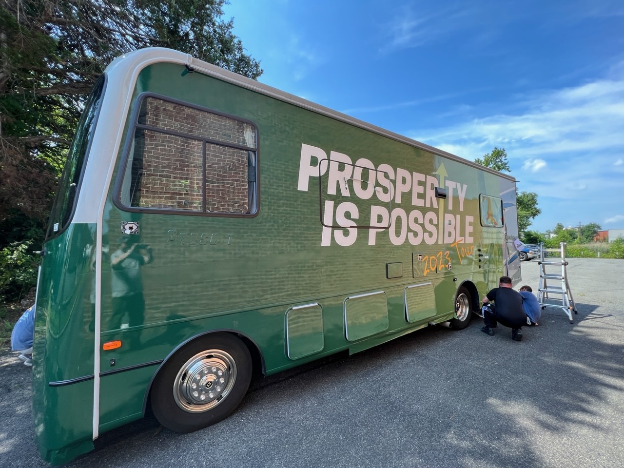 New photos of the Prosperity Is Possible tour bus as it hits the road ...