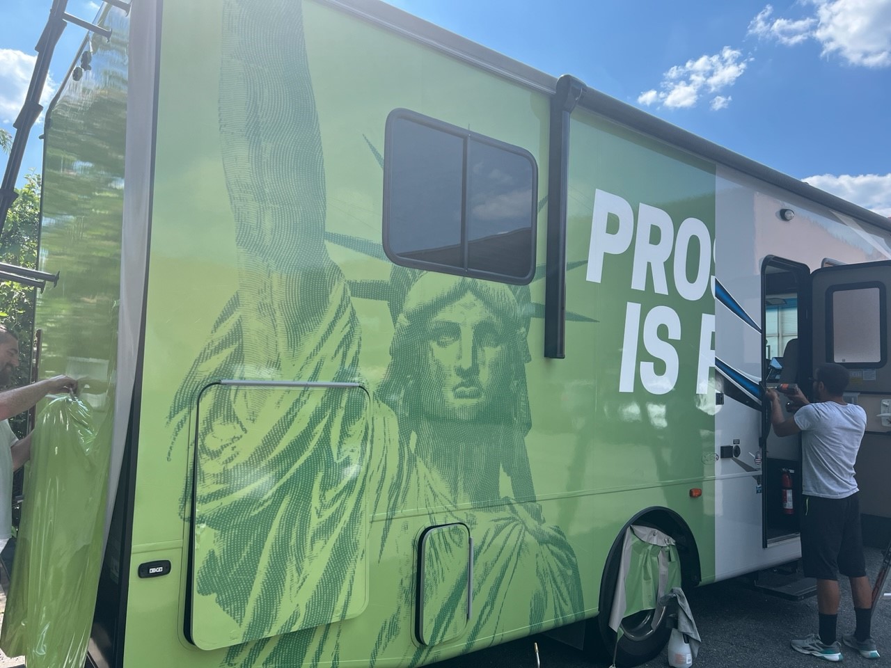 New photos of the Prosperity Is Possible tour bus as it hits the road ...
